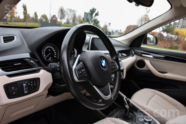 Blue BMW X1 2018 in Riga, with an engine capacity of 2.00 L and mileage of 219 thousand km for 14990 €, photo 5 on AUTOMOTO.COM.LV