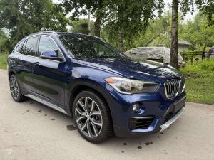 Blue BMW X1 2018 in Kaunas, with an engine capacity of 2.00 L and mileage of 50 thousand km for 15950 €, photo 4 on AUTOMOTO.COM.LV