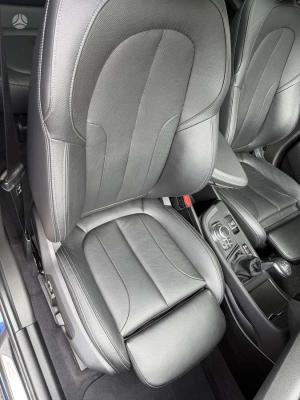 Blue BMW X1 2018 in Kaunas, with an engine capacity of 2.00 L and mileage of 50 thousand km for 15950 €, photo 12 on AUTOMOTO.COM.LV