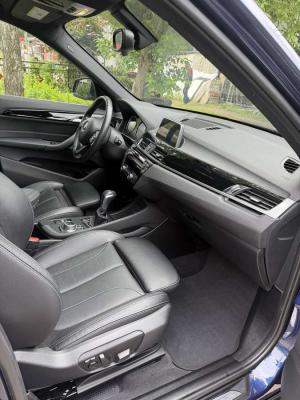 Blue BMW X1 2018 in Kaunas, with an engine capacity of 2.00 L and mileage of 50 thousand km for 15950 €, photo 14 on AUTOMOTO.COM.LV