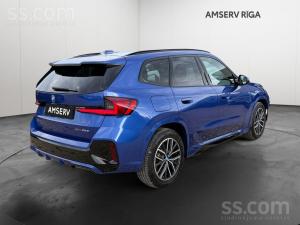 Blue BMW X1 2023 in Riga, with an engine capacity of 1.50 L and mileage of 104 thousand km for 35900 €, photo 3 on AUTOMOTO.COM.LV