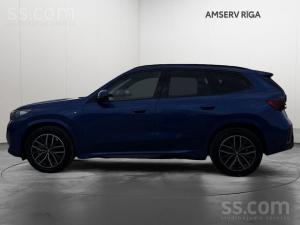 Blue BMW X1 2023 in Riga, with an engine capacity of 1.50 L and mileage of 104 thousand km for 35900 €, photo 4 on AUTOMOTO.COM.LV