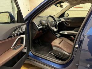 Blue BMW X1 2023 in Marijampole, with an engine capacity of 1.50 L and mileage of 107 thousand km for 30855 €, photo 8 on AUTOMOTO.COM.LV