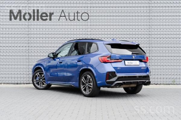 Blue BMW X1 2024 in Riga, with an engine capacity of 2.00 L and mileage of 83 thousand km for 41150 €, photo 3 on AUTOMOTO.COM.LV