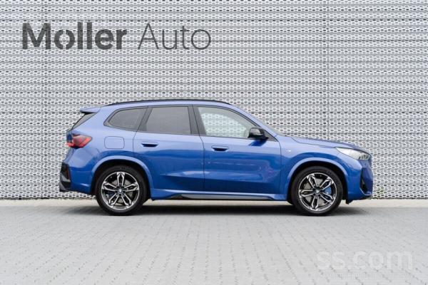 Blue BMW X1 2024 in Riga, with an engine capacity of 2.00 L and mileage of 83 thousand km for 41150 €, photo 5 on AUTOMOTO.COM.LV