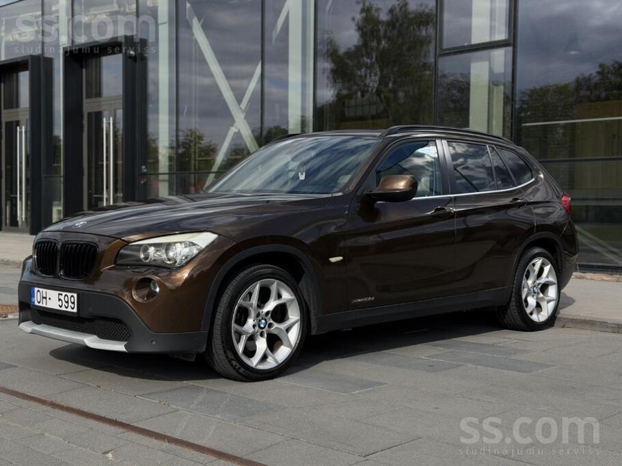 Brown BMW X1 2009 in Riga, with an engine capacity of 2.00 L and mileage of 297 thousand km for 6900 €, photo 1 on AUTOMOTO.COM.LV