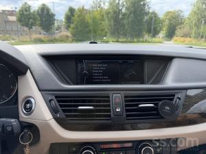 Brown BMW X1 2009 in Riga, with an engine capacity of 2.00 L and mileage of 297 thousand km for 6900 €, photo 13 on AUTOMOTO.COM.LV