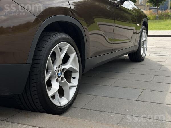 Brown BMW X1 2009 in Riga, with an engine capacity of 2.00 L and mileage of 298 thousand km for 6800 €, photo 10 on AUTOMOTO.COM.LV