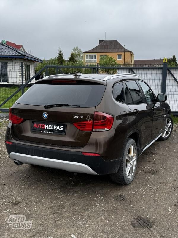 Brown BMW X1 2010 in Klaipeda, with an engine capacity of 2.00 L and mileage of 371 thousand km for 5399 €, photo 5 on AUTOMOTO.COM.LV