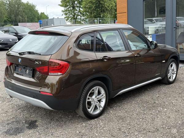 Brown BMW X1 2010 in Kaunas, with an engine capacity of 2.00 L and mileage of 193 thousand km for 5750 €, photo 5 on AUTOMOTO.COM.LV