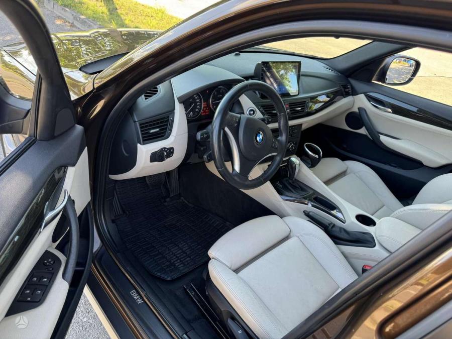 Brown BMW X1 2010 in Kaunas, with an engine capacity of 2.00 L and mileage of 268 thousand km for 6590 €, photo 16 on AUTOMOTO.COM.LV