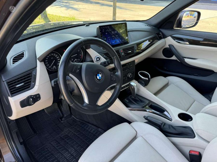 Brown BMW X1 2010 in Kaunas, with an engine capacity of 2.00 L and mileage of 268 thousand km for 6590 €, photo 17 on AUTOMOTO.COM.LV