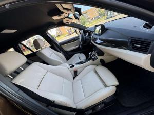 Brown BMW X1 2010 in Kaunas, with an engine capacity of 2.00 L and mileage of 268 thousand km for 6590 €, photo 23 on AUTOMOTO.COM.LV