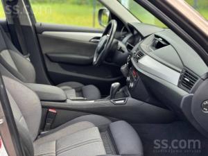 Brown BMW X1 2010 in Riga, with an engine capacity of 2.00 L and mileage of 272 thousand km for 5450 €, photo 17 on AUTOMOTO.COM.LV