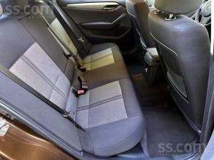 Brown BMW X1 2010 in Riga, with an engine capacity of 2.00 L and mileage of 222 thousand km for 6200 €, photo 13 on AUTOMOTO.COM.LV
