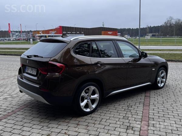 Brown BMW X1 2011 in Riga, with an engine capacity of 2.00 L and mileage of 224 thousand km for 8990 €, photo 4 on AUTOMOTO.COM.LV