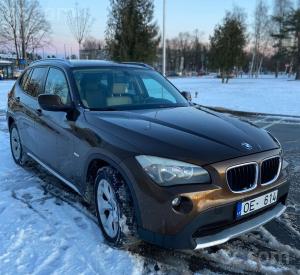 Brown BMW X1 2011 in Riga, with an engine capacity of 2.00 L and mileage of 0 thousand km for 6600 €, photo  on AUTOMOTO.COM.LV