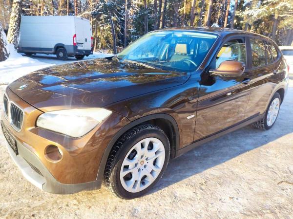Brown BMW X1 2011 in Utena, with an engine capacity of 2.00 L and mileage of 268 thousand km for 6300 €, photo 2 on AUTOMOTO.COM.LV