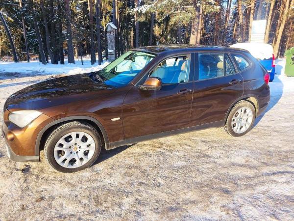 Brown BMW X1 2011 in Utena, with an engine capacity of 2.00 L and mileage of 268 thousand km for 6300 €, photo 3 on AUTOMOTO.COM.LV