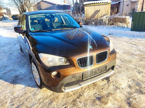 Brown BMW X1 2011 in Utena, with an engine capacity of 2.00 L and mileage of 268 thousand km for 6300 €, photo 6 on AUTOMOTO.COM.LV