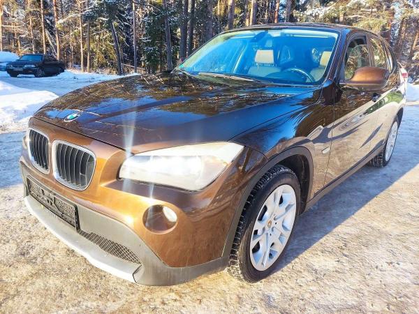 Brown BMW X1 2011 in Utena, with an engine capacity of 2.00 L and mileage of 268 thousand km for 6300 €, photo 8 on AUTOMOTO.COM.LV
