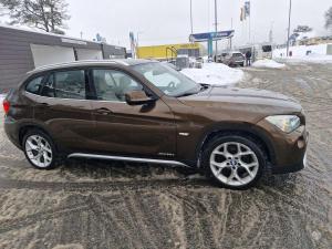 Brown BMW X1 2011 in Utena, with an engine capacity of 2.00 L and mileage of 265 thousand km for 7650 €, photo  on AUTOMOTO.COM.LV