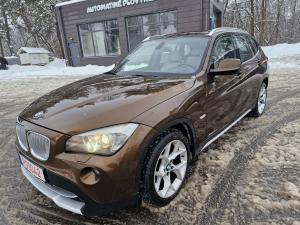 Brown BMW X1 2011 in Utena, with an engine capacity of 2.00 L and mileage of 265 thousand km for 7650 €, photo 11 on AUTOMOTO.COM.LV