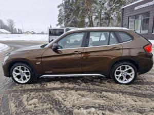 Brown BMW X1 2011 in Utena, with an engine capacity of 2.00 L and mileage of 265 thousand km for 7650 €, photo 13 on AUTOMOTO.COM.LV