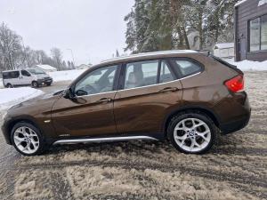 Brown BMW X1 2011 in Utena, with an engine capacity of 2.00 L and mileage of 265 thousand km for 7650 €, photo 16 on AUTOMOTO.COM.LV