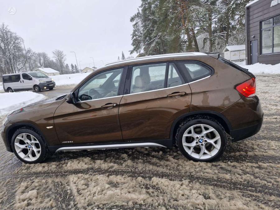 Brown BMW X1 2011 in Utena, with an engine capacity of 2.00 L and mileage of 265 thousand km for 7650 €, photo 16 on AUTOMOTO.COM.LV