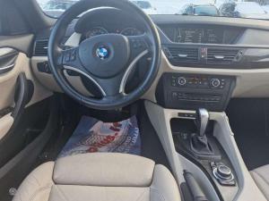 Brown BMW X1 2011 in Utena, with an engine capacity of 2.00 L and mileage of 265 thousand km for 7650 €, photo 25 on AUTOMOTO.COM.LV