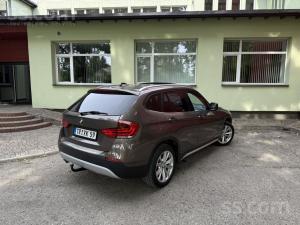 Brown BMW X1 2011 in Cesis, with an engine capacity of 2.00 L and mileage of 258 thousand km for 7650 €, photo 5 on AUTOMOTO.COM.LV