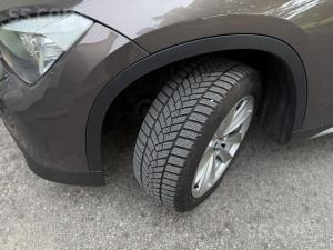 Brown BMW X1 2011 in Cesis, with an engine capacity of 2.00 L and mileage of 258 thousand km for 7650 €, photo 25 on AUTOMOTO.COM.LV