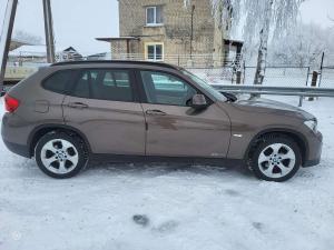 Brown BMW X1 2012 in Raseiniai, with an engine capacity of 2.00 L and mileage of 124 thousand km for 7450 €, photo 9 on AUTOMOTO.COM.LV
