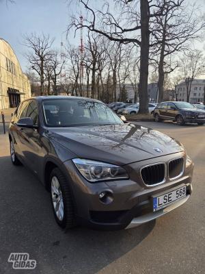 Brūns BMW X1 2012 Kauņa, ar dzinēja tilpumu 2.00 L un nobraukumu 190 tūkst. km par 9400 €, foto  vietnē AUTOMOTO.COM.LV
