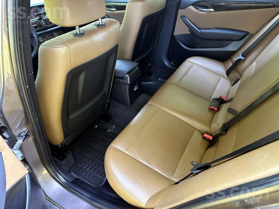 Brown BMW X1 2012 in Riga, with an engine capacity of 2.00 L and mileage of 213 thousand km for 7900 €, photo 13 on AUTOMOTO.COM.LV