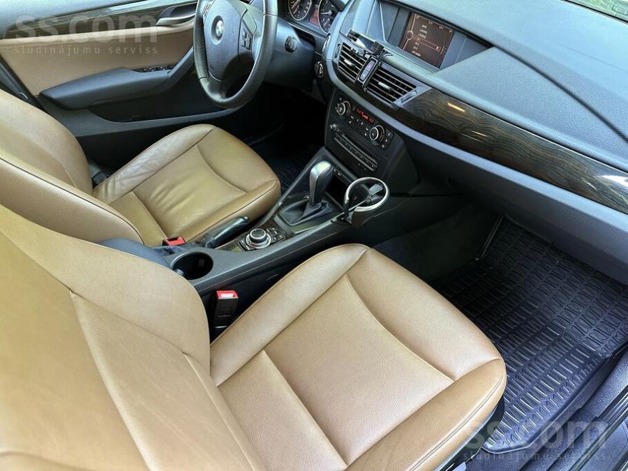 Brown BMW X1 2012 in Riga, with an engine capacity of 2.00 L and mileage of 213 thousand km for 7900 €, photo 15 on AUTOMOTO.COM.LV