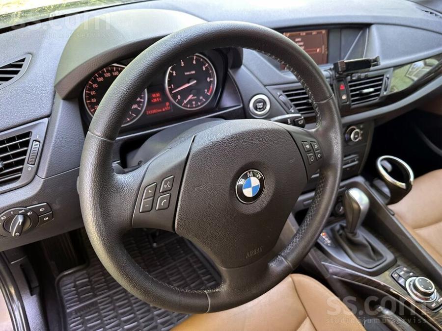 Brown BMW X1 2012 in Riga, with an engine capacity of 2.00 L and mileage of 213 thousand km for 7900 €, photo 25 on AUTOMOTO.COM.LV