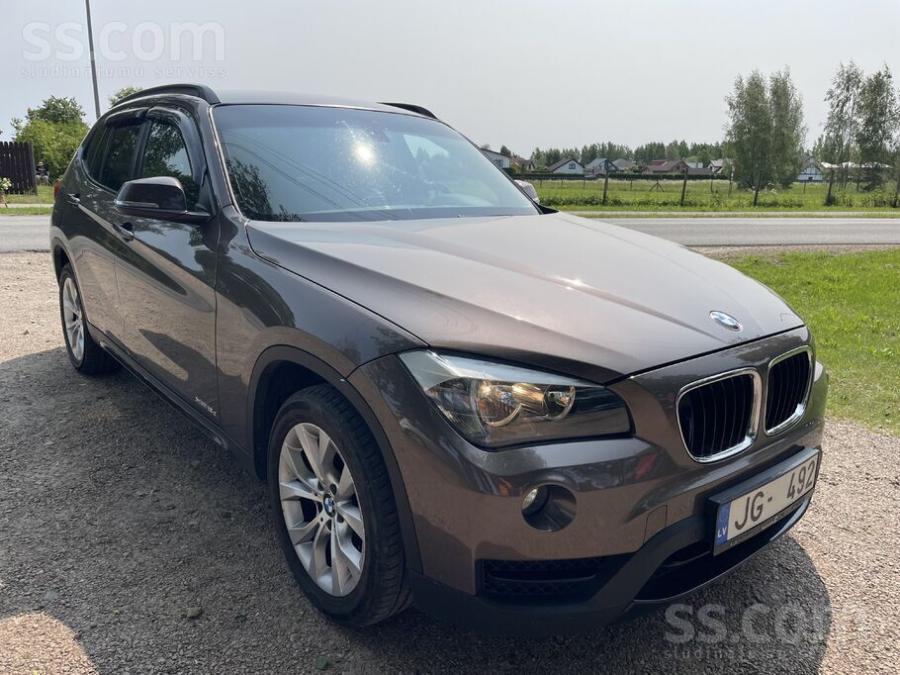 Brown BMW X1 2013 in Riga, with an engine capacity of 2.00 L and mileage of 274 thousand km for 6990 €, photo 7 on AUTOMOTO.COM.LV