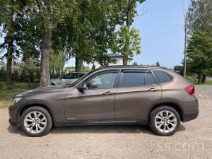 Brown BMW X1 2013 in Riga, with an engine capacity of 2.00 L and mileage of 274 thousand km for 6990 €, photo 2 on AUTOMOTO.COM.LV