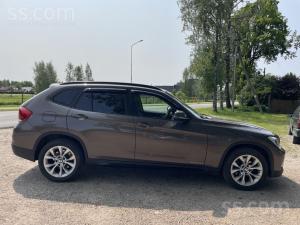 Brown BMW X1 2013 in Riga, with an engine capacity of 2.00 L and mileage of 274 thousand km for 7490 €, photo 7 on AUTOMOTO.COM.LV