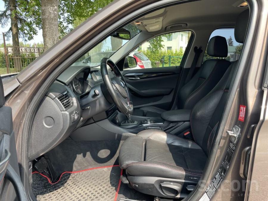 Brown BMW X1 2013 in Riga, with an engine capacity of 2.00 L and mileage of 274 thousand km for 7490 €, photo 11 on AUTOMOTO.COM.LV