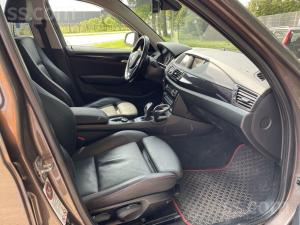 Brown BMW X1 2013 in Riga, with an engine capacity of 2.00 L and mileage of 274 thousand km for 7490 €, photo 17 on AUTOMOTO.COM.LV
