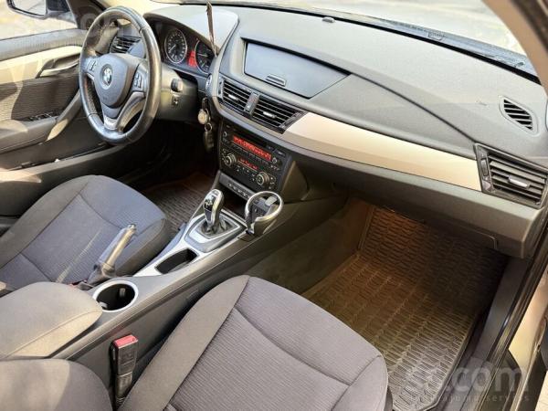 Brown BMW X1 2013 in Bauska, with an engine capacity of 2.00 L and mileage of 381 thousand km for 6850 €, photo 9 on AUTOMOTO.COM.LV