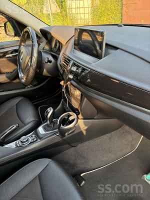 Brown BMW X1 2014 in Riga, with an engine capacity of 2.00 L and mileage of 169 thousand km for 10450 €, photo 5 on AUTOMOTO.COM.LV