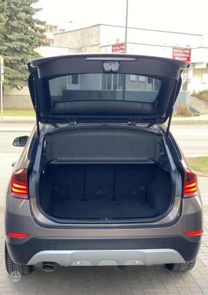 Brown BMW X1 2014 in Marijampole, with an engine capacity of 2.00 L and mileage of 242 thousand km for 8450 €, photo 14 on AUTOMOTO.COM.LV
