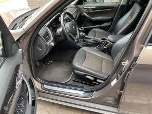 Brown BMW X1 2014 in Marijampole, with an engine capacity of 2.00 L and mileage of 242 thousand km for 8450 €, photo 19 on AUTOMOTO.COM.LV