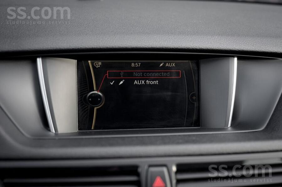 Brown BMW X1 2014 in Tukums, with an engine capacity of 2.00 L and mileage of 225 thousand km for 10590 €, photo 22 on AUTOMOTO.COM.LV