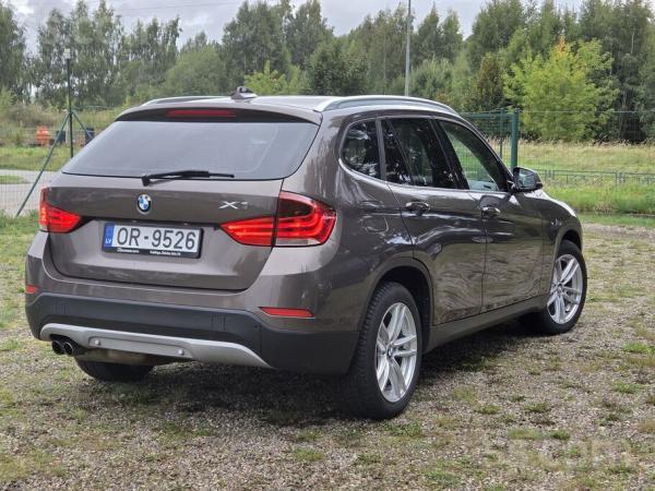 Brown BMW X1 2014 in Kuldiga, with an engine capacity of 2.00 L and mileage of 223 thousand km for 7995 €, photo 3 on AUTOMOTO.COM.LV