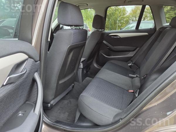 Brown BMW X1 2014 in Kuldiga, with an engine capacity of 2.00 L and mileage of 223 thousand km for 7995 €, photo 8 on AUTOMOTO.COM.LV